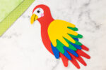 Handprint Parrot Craft - Made To Be A Momma
